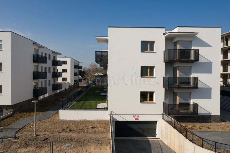 Modern White Apartment Buildings with Balconies Stock Image - Image of ...