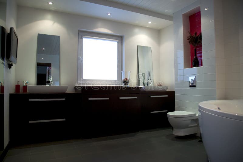 Modern White Bathroom with Brown Furniture Stock Photo - Image of white ...