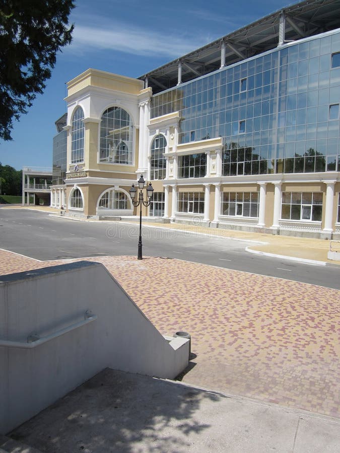 Modern White Building with Large Windows, Flat Roof, and Decorative ...