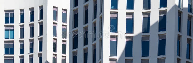 Modern White Building with Vertical Windows Stock Image - Image of ...