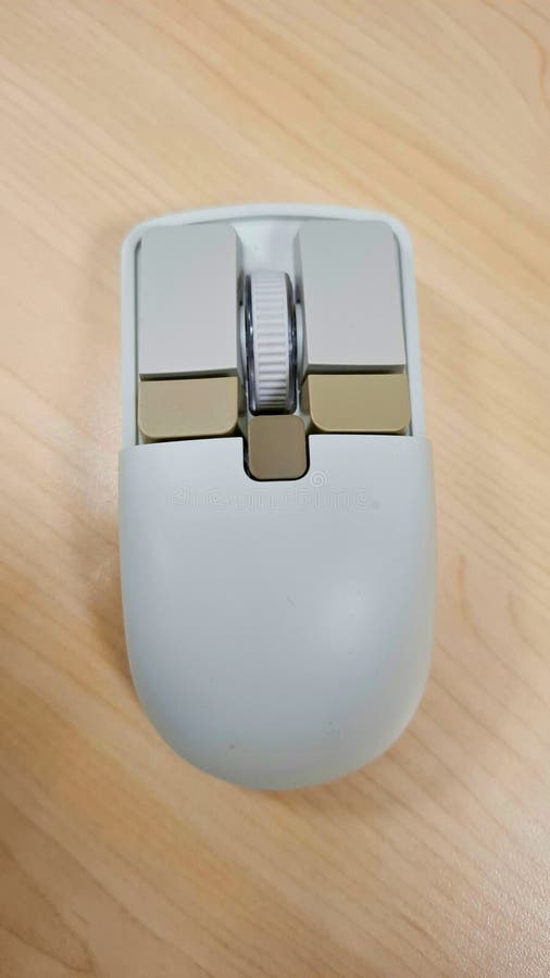 A Modern White Computer Mouse with a Futuristic and Minimalist Design ...