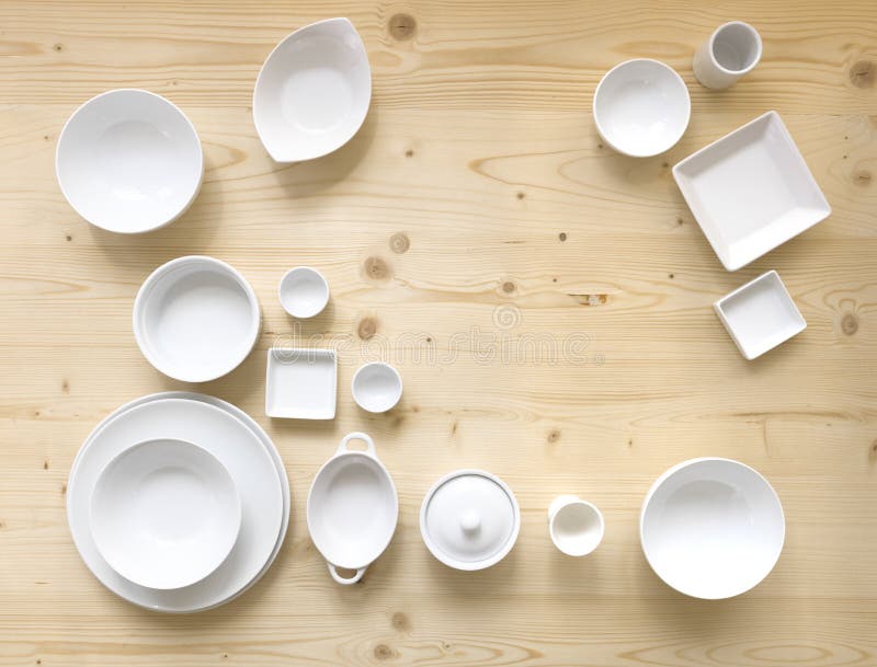 Modern, White Crockery, in Different Designs, Stands on a Light Wooden ...