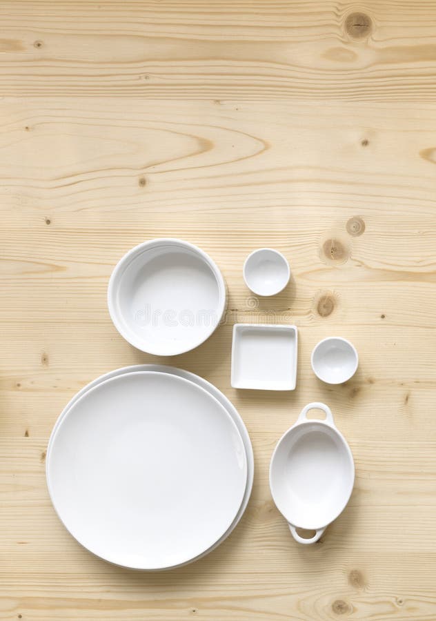 Modern, White Crockery, in Different Designs, Stands on a Light Wooden ...