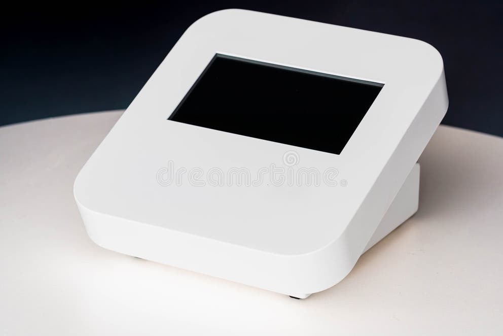 Modern White Digital Display Device on Gray Surface Isolated on Dark ...
