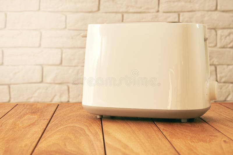 Modern White Electric Toaster for Bread on the Wooden Kitchen Table ...