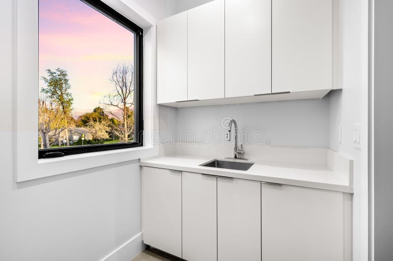 Modern White Kitchen with Sunset View Stock Image - Image of bright ...