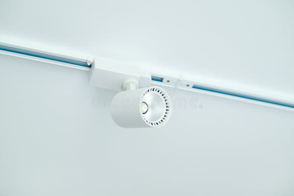 Modern White LED Track Light Fixture Mounted on Ceiling Rail ...