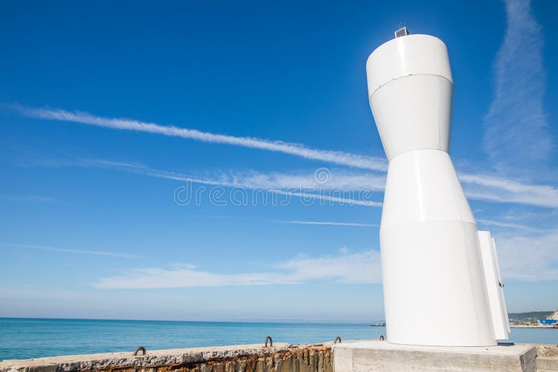 Modern white lighthouse stock image. Image of white - 150564679