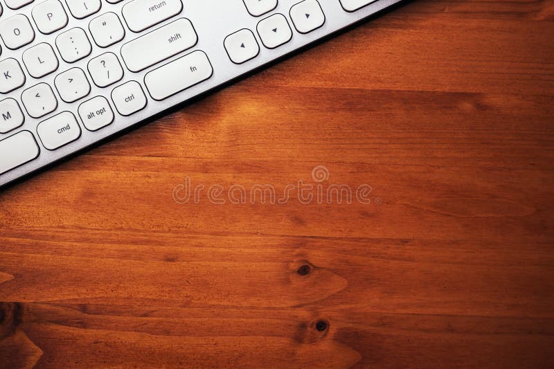 Modern White Metallic Personal Computer Keyboard on Brown Office Desk ...