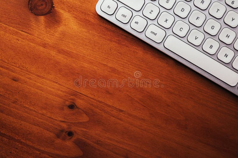 Modern White Metallic Personal Computer Keyboard on Brown Office Desk ...