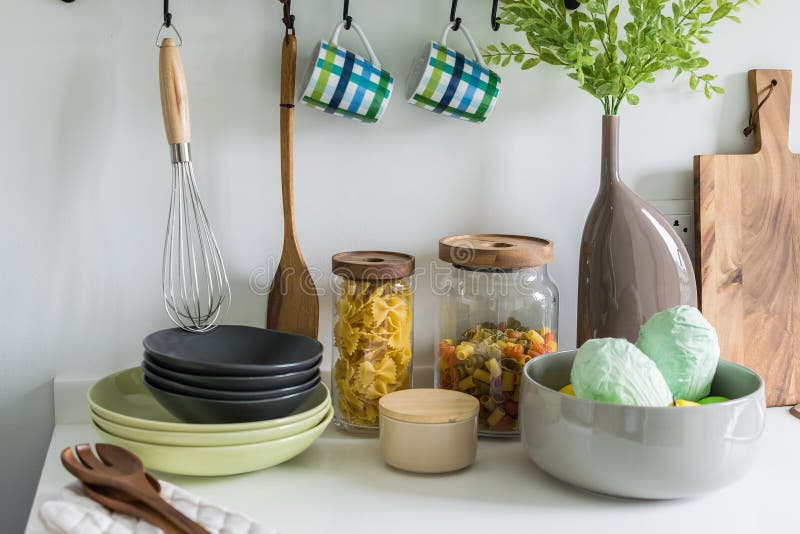 Modern White Pantry with Utensils Stock Image - Image of plant ...