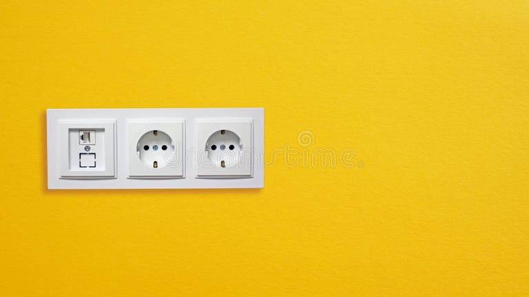 Modern White Power Outlets and Internet Socket on Orange Wall ...