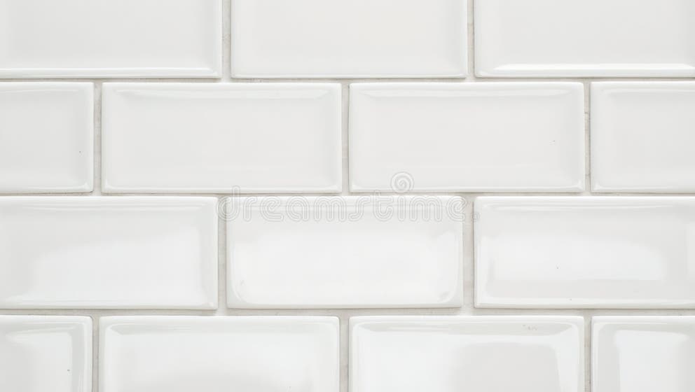 Modern White Subway Tile Wall with Glossy Finish and Even Grout Lines ...