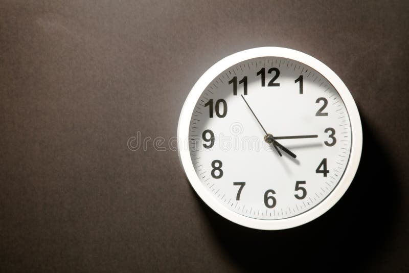 Modern White Wall Clock with Black Time Pointer Off Center on Black ...