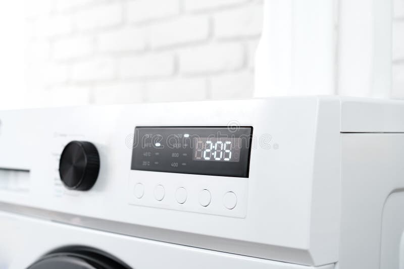 Modern White Washing Machine in a Laundry Room Close Up Stock Photo ...