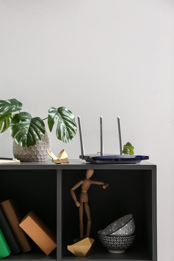 Modern Wi-fi Router on Light Table in Room Stock Photo - Image of ...