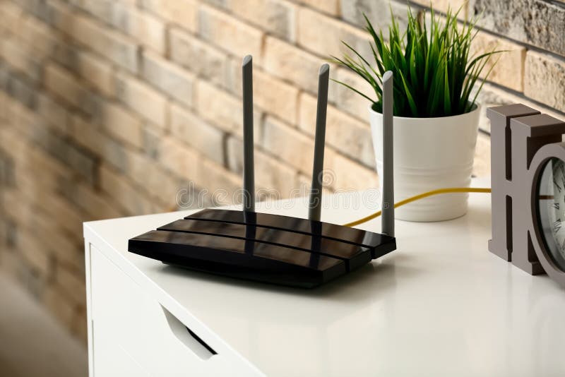 Modern Wi-fi Router on Light Table in Office Stock Photo - Image of ...