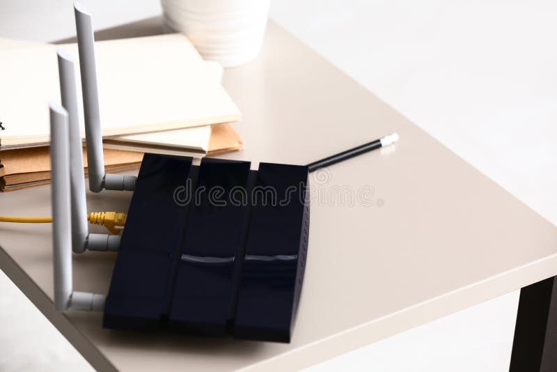 Modern Wi-fi Router on Light Table in Office Stock Image - Image of ...
