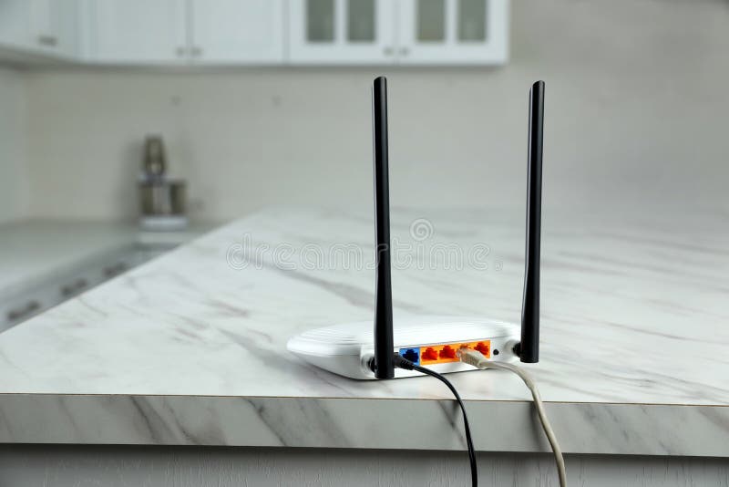 Modern Wi-Fi Router on White Marble Table in Kitchen Stock Image ...