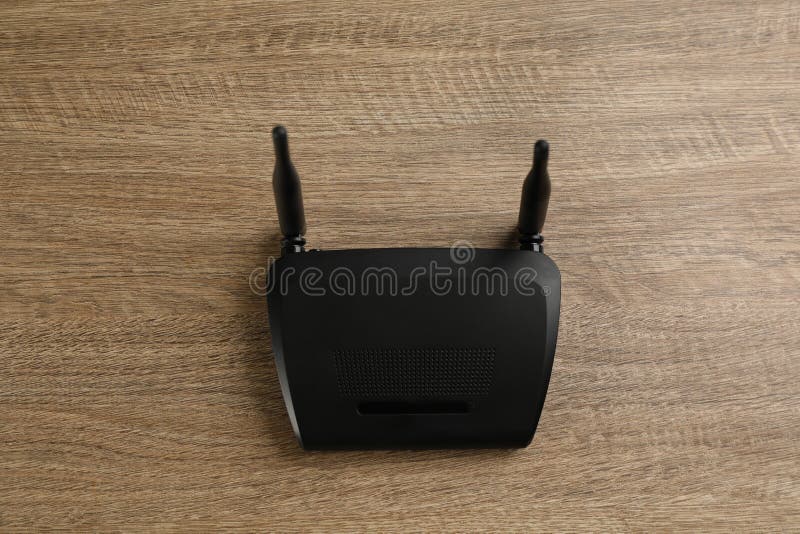 Wi-Fi Router On Wooden Table Stock Photo - Image of gateway, connect ...