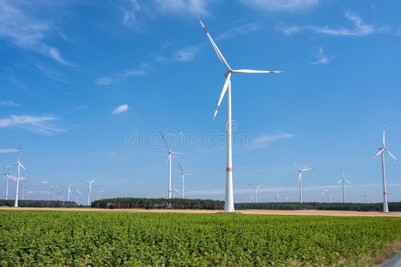 Modern Wind Energy Turbines Stock Image - Image of pylon, cornfield ...