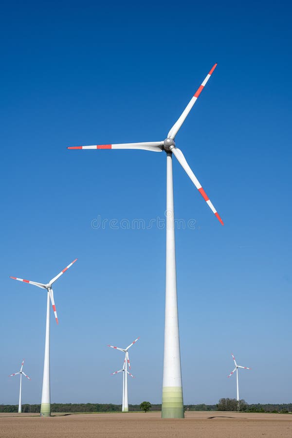 Modern wind turbines stock photo. Image of warming, field - 298969474