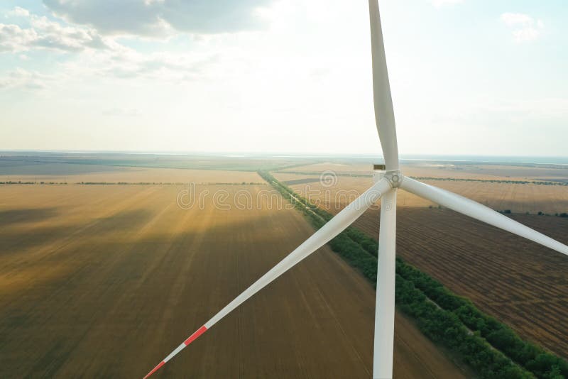 Old Windmill In A Field Near The Forest At Sunset Stock Image - Image ...