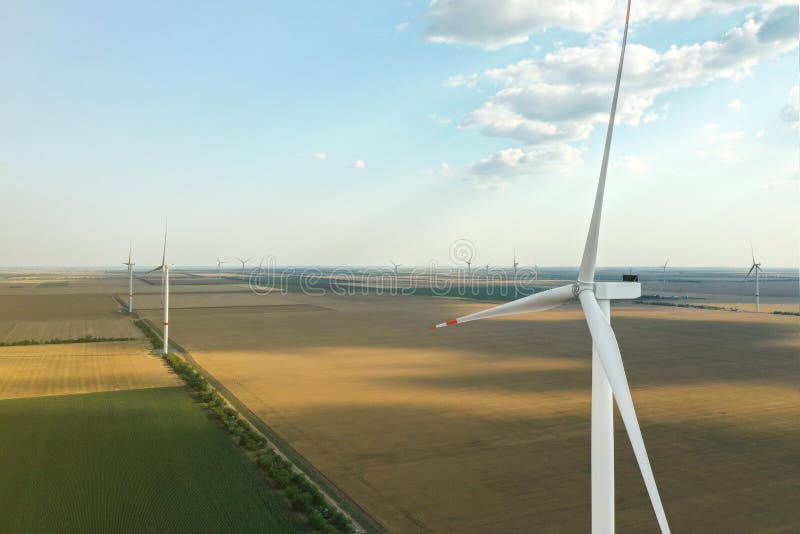 Windmill in Field, Space for Text. Energy Efficiency Stock Photo ...
