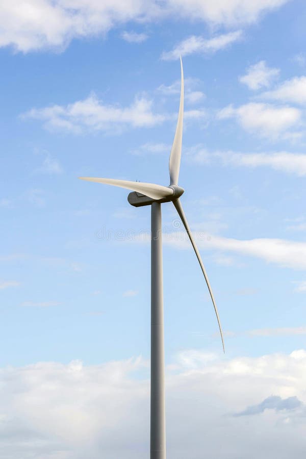 Modern Windmill on a Sunny Day and with Idyllic White Clouds, Closeup ...