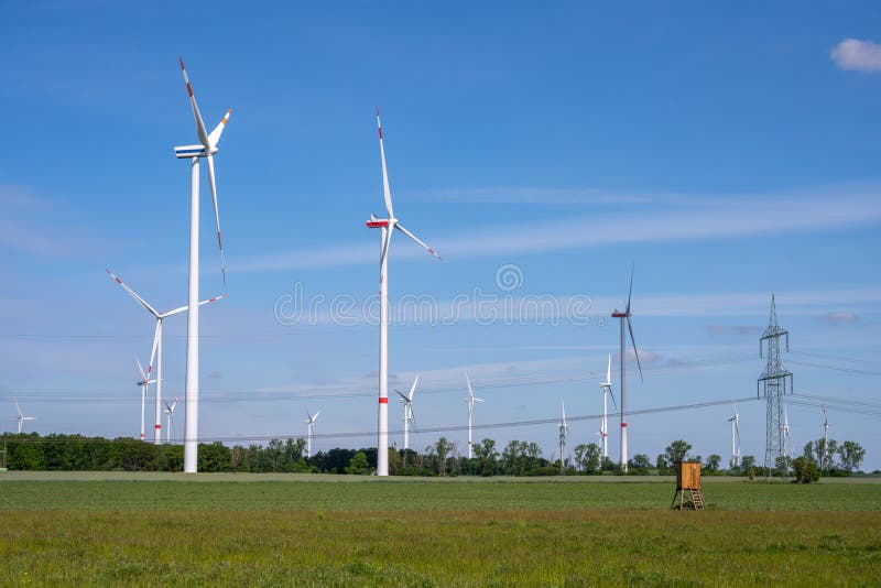 Modern Windmills and a Power Line Stock Photo - Image of cables, corn ...