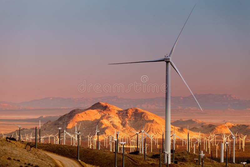 Modern windmills in sunset stock image. Image of environment - 22888315