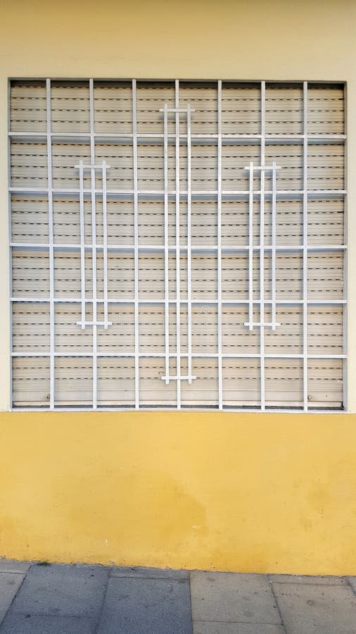 Modern Window with Security Shutters and Decorative Steel Bars. Stock ...