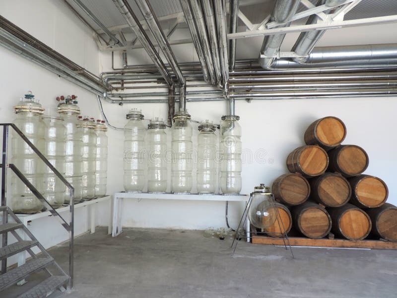 Modern Winery. Old Wine Barrels Stacked in a Pyramid Stock Photo ...