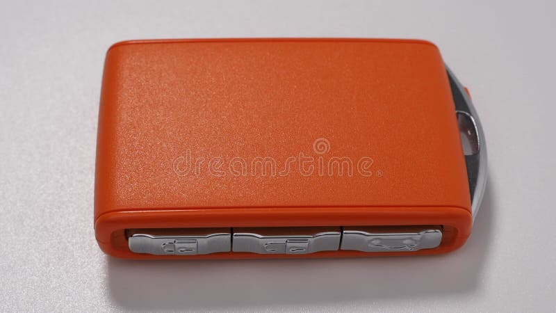 Modern Wireless Orange Car Ignition Key on a White Background. Stock ...