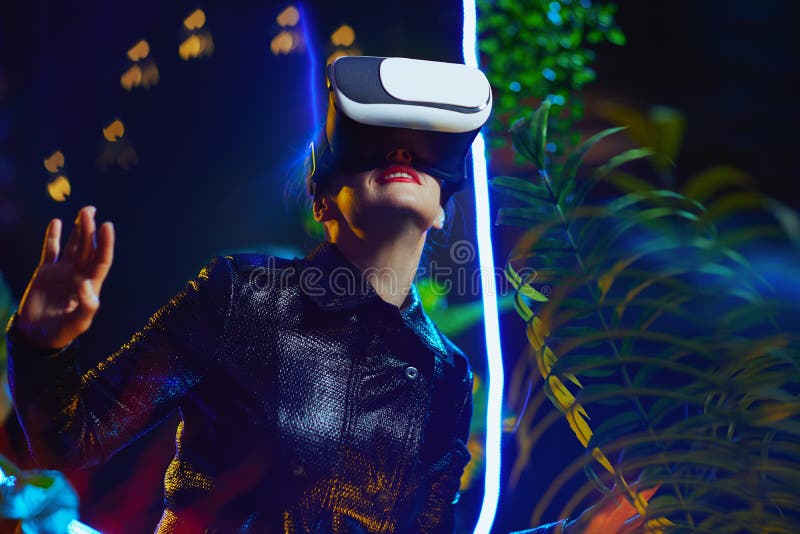 Modern Woman in Metaverse in Vr Goggles Exploring Stock Photo - Image ...