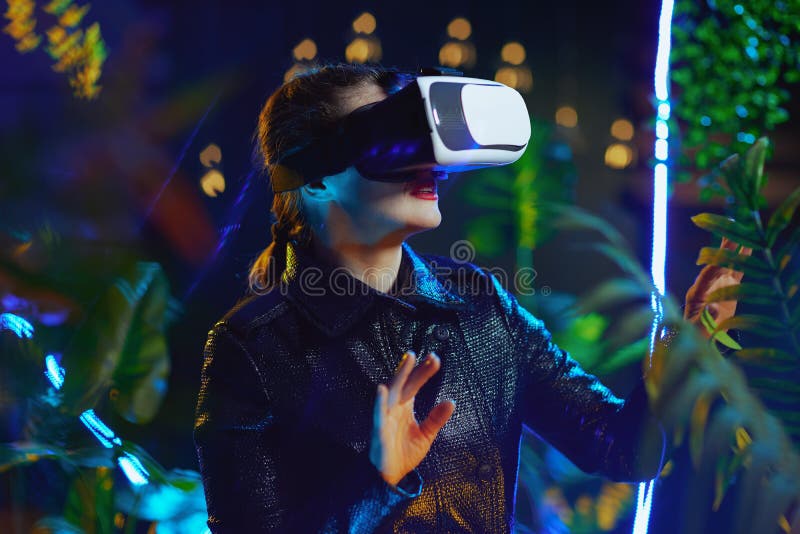 Modern Woman in Metaverse in Vr Goggles Exploring Stock Photo - Image ...