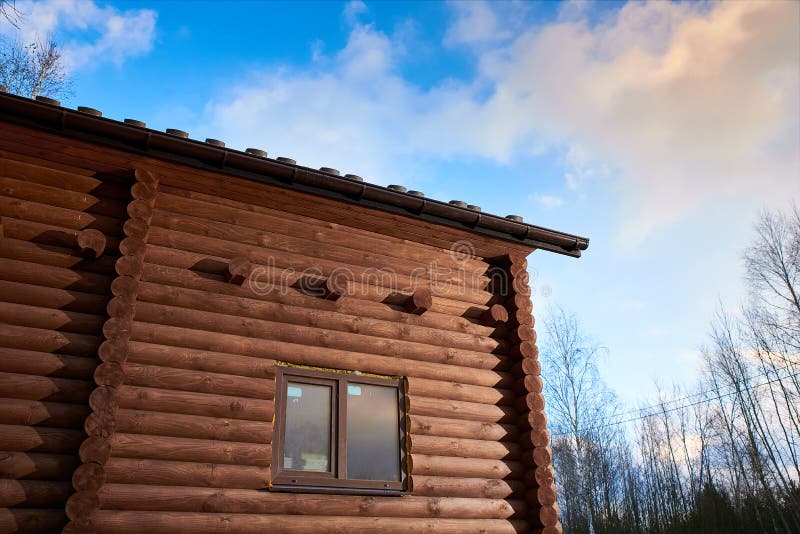 Wooden House Made of Round Logs Stock Photo - Image of building ...