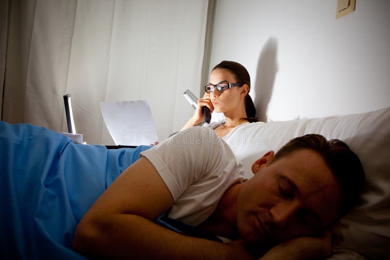 Modern Workaholic Couple stock photo. Image of glasses - 84507198