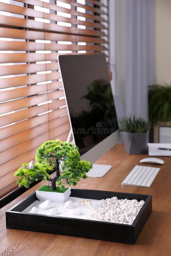 Modern Workplace with Beautiful Miniature Zen Garden and Computer Stock ...