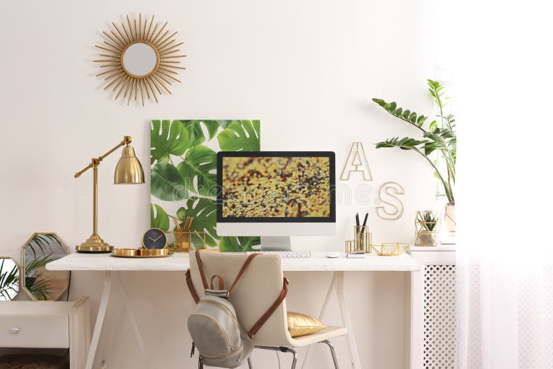 Modern Workplace with Computer and Golden Decor on Desk. Stylish ...