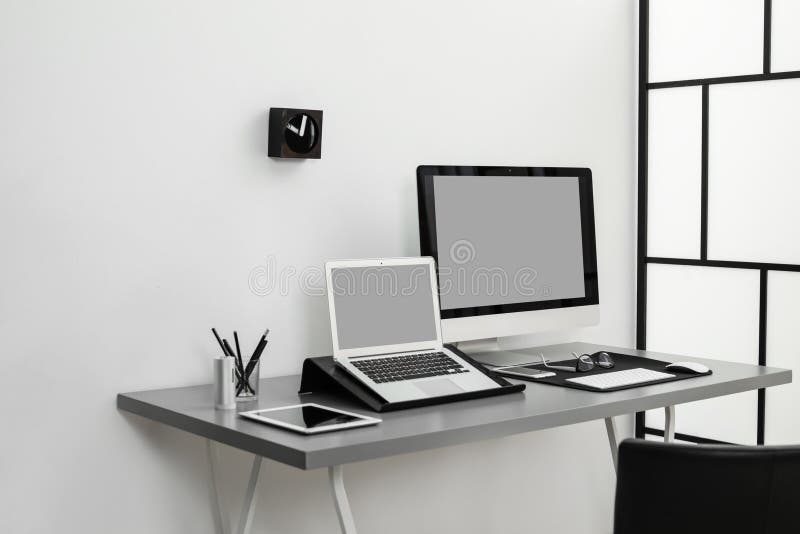 Modern Workplace Interior with Computers on Table. Stock Photo - Image ...
