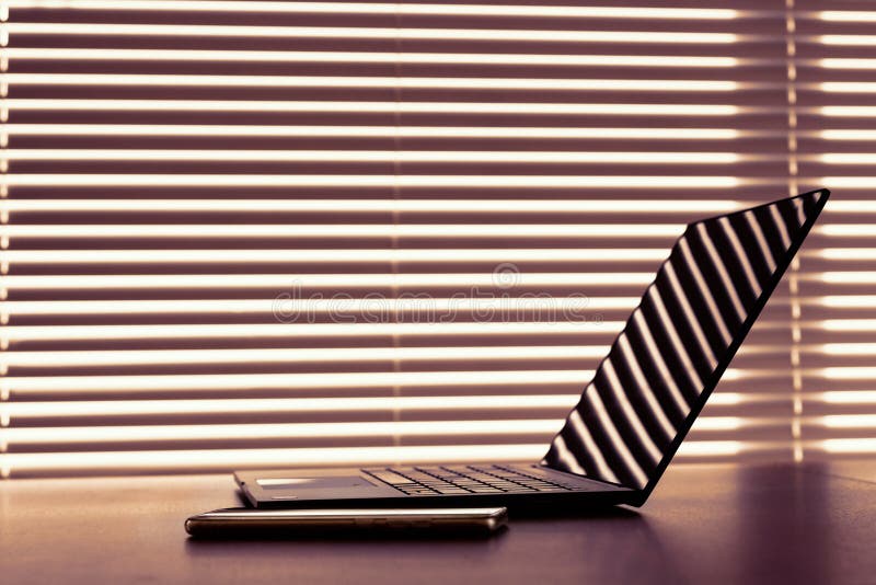 Laptop and blinds stock photo. Image of industry, connection - 8024926