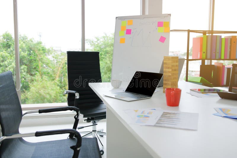 Modern Workplace with Laptop on the Desk in Office. Stock Photo - Image ...