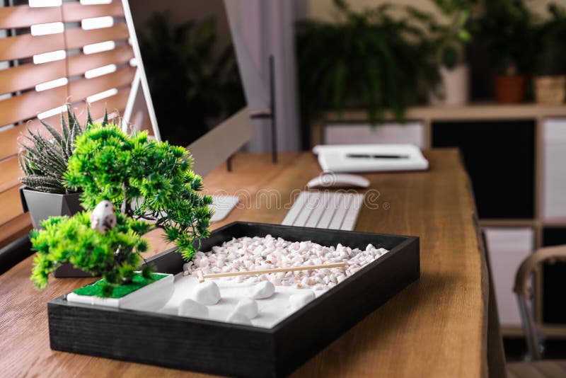 Modern Workplace with Miniature Zen Garden and Computer in Room Stock ...