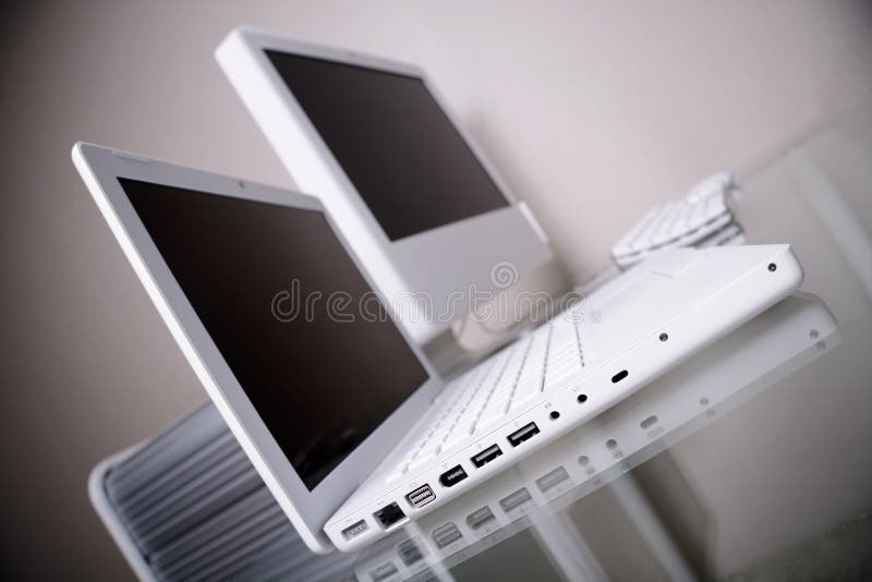 Modern Workplace with White Laptop & Computer. Til Stock Photo - Image ...