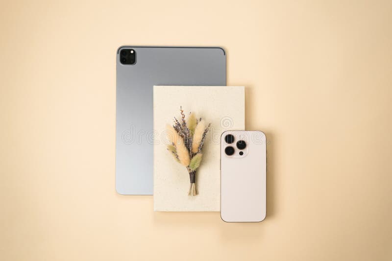 Modern Workspace Arrangement with Tablet, Smartphone, and Notebook ...