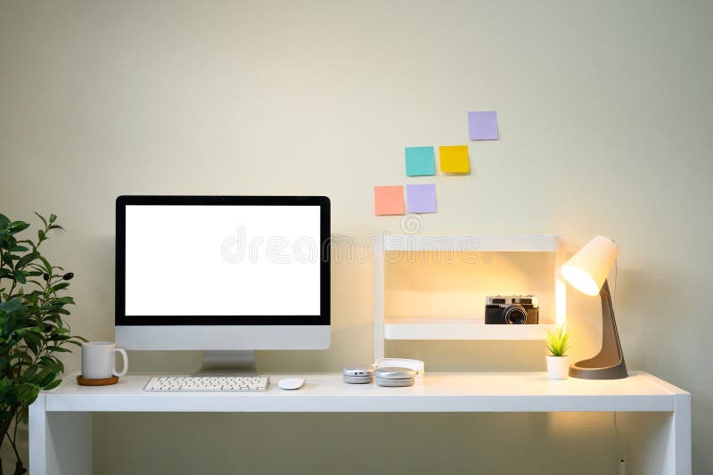 Modern Workspace with Desktop Monitor, Sticky Notes on Wall, Desk Lamp ...