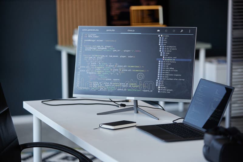 Modern Workspace Displaying Coding Interface and Devices Stock Photo - Image of programming ...