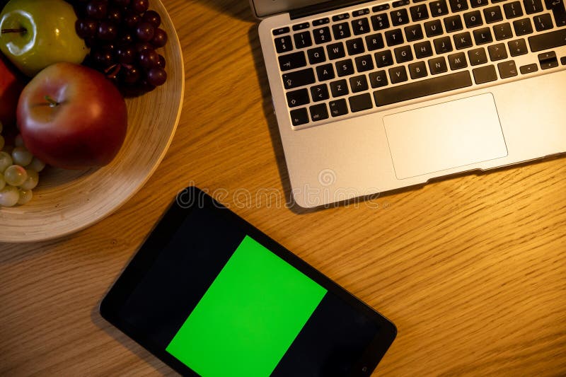 A Modern Workspace that Features Vibrant Fruits Alongside Advanced ...