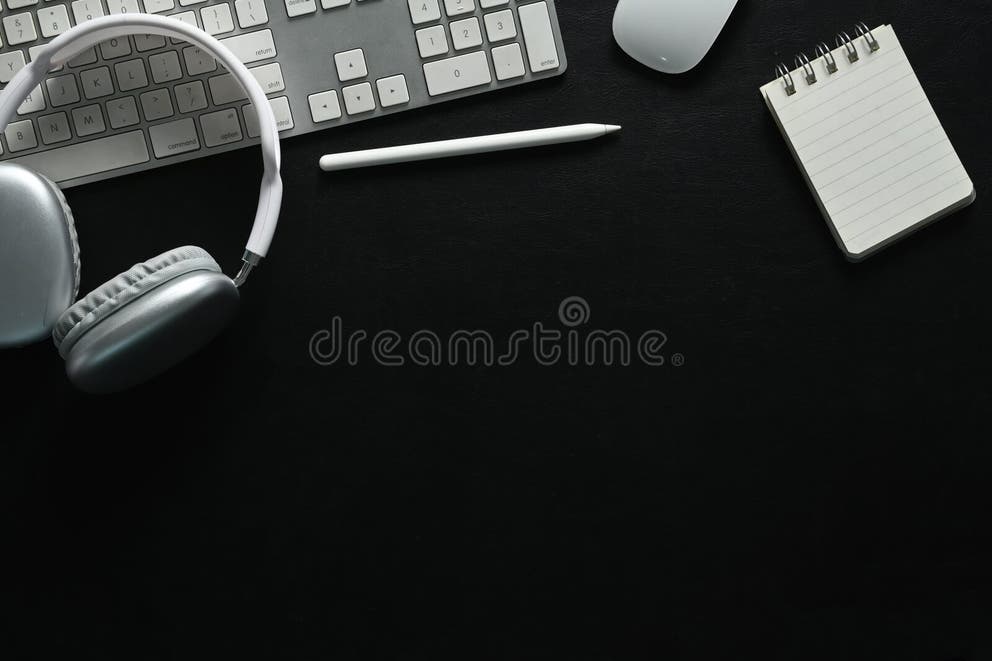 Modern Workspace with Headphone, Notepad, Keyboard and Mouse on Black ...